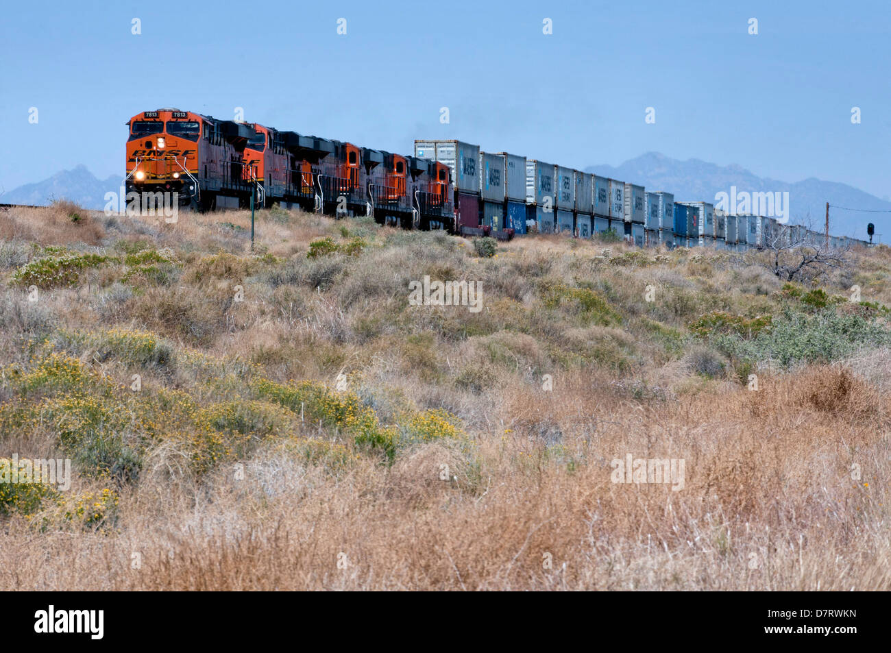 A train from the BNSF Railway line travelling through California's Mojave Desert, near the town ...