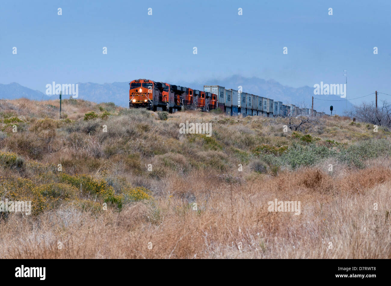 A train from the BNSF Railway line travelling through California's Mojave Desert, near the town ...