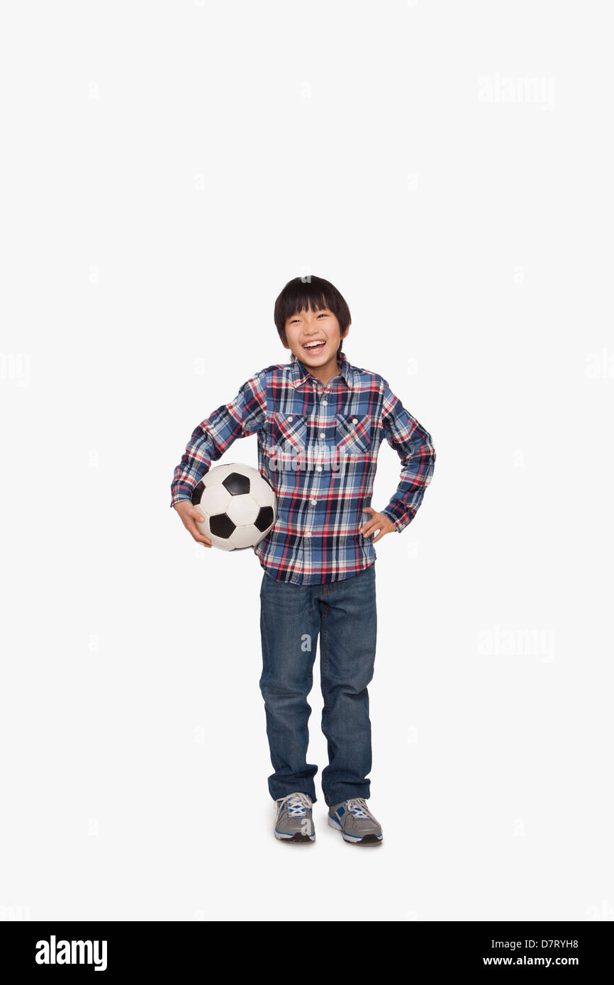 Boy with football Stock Photo - Alamy