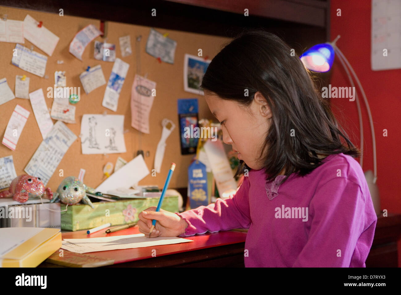 student working in bedroom Stock Photo - Alamy