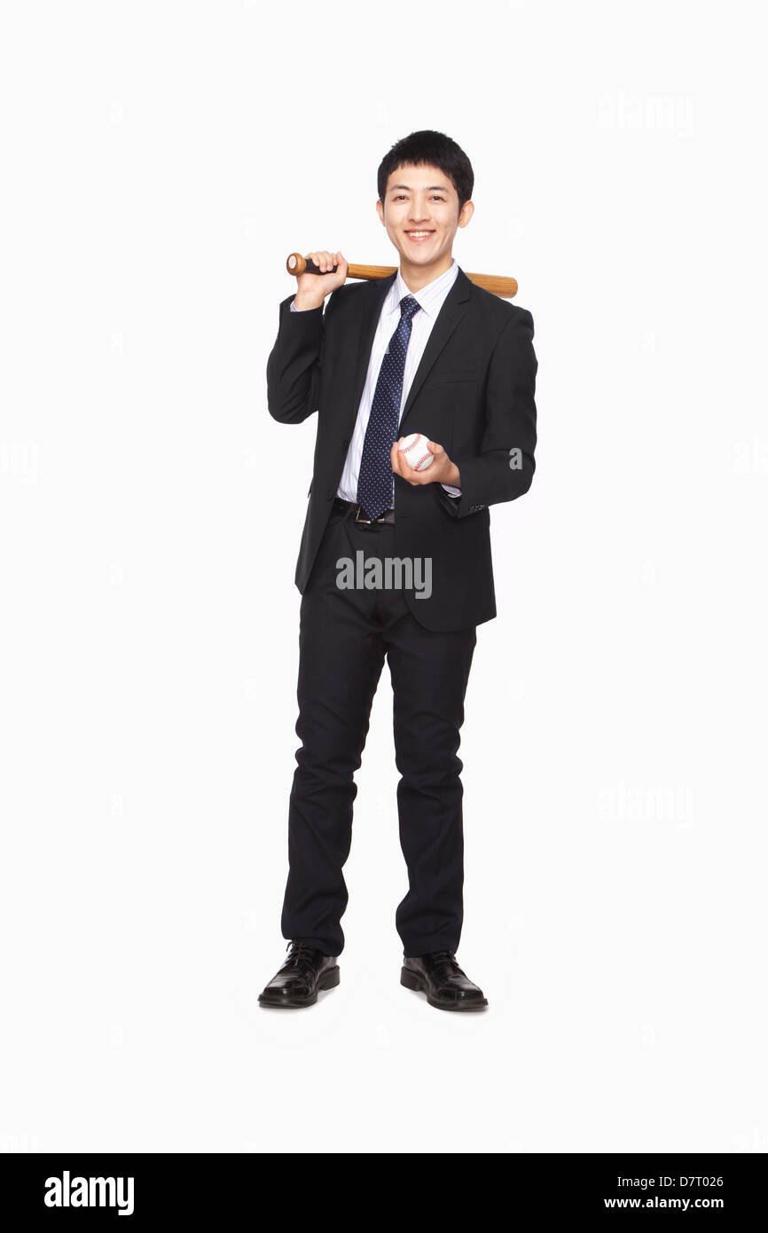 Businessman bat baseball Cut Out Stock Images & Pictures - Alamy
