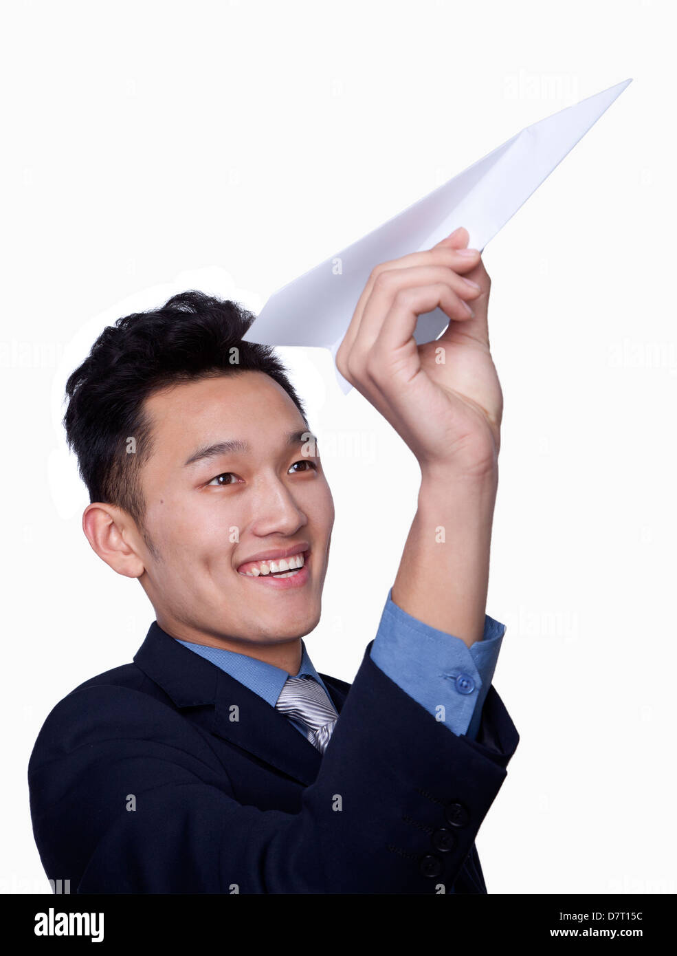 Businessman Flying Paper Airplane Stock Photo - Alamy