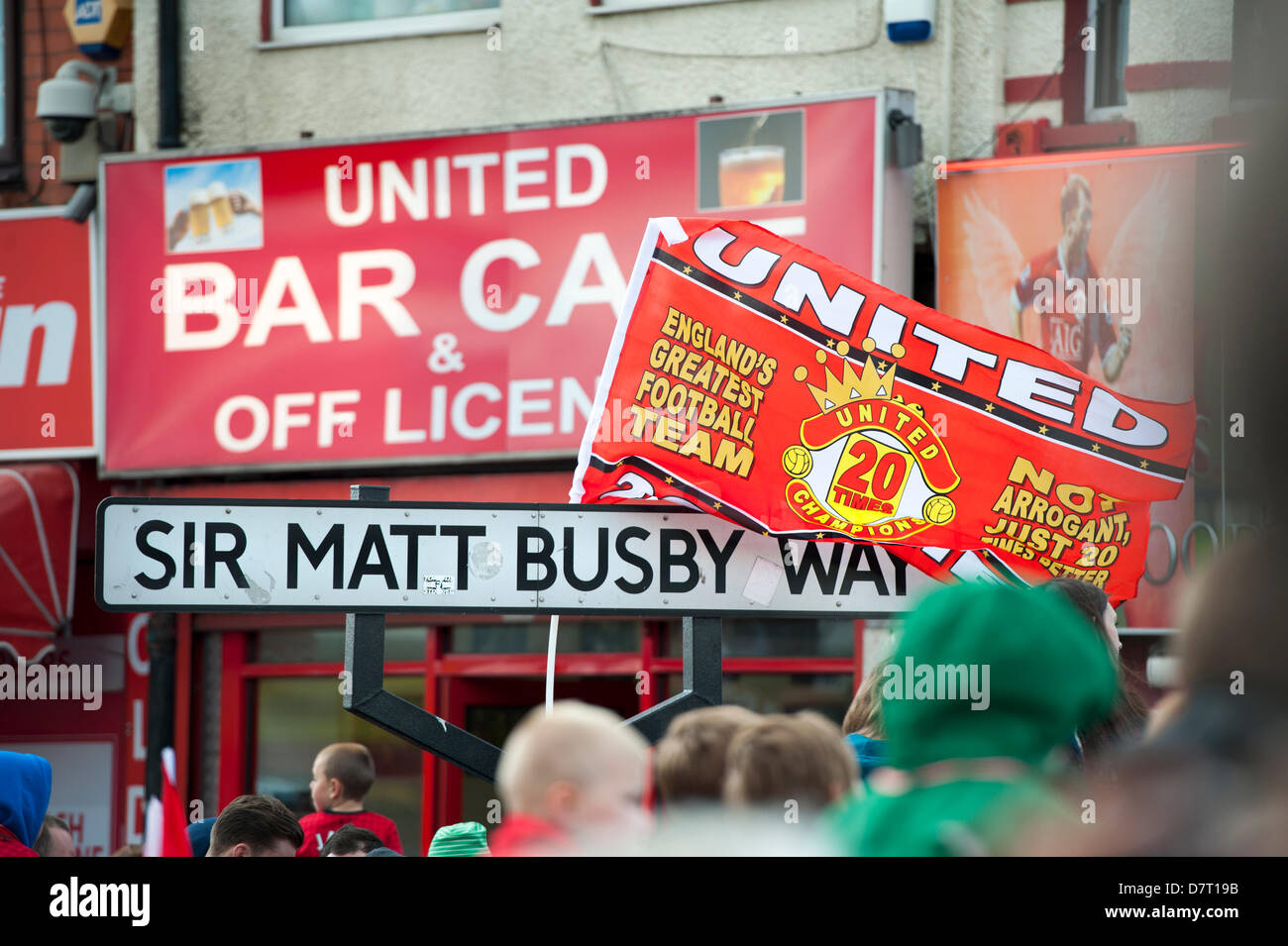 Manchester, UK. 13th May, 2013. flags draped over the road sign for Sir ...