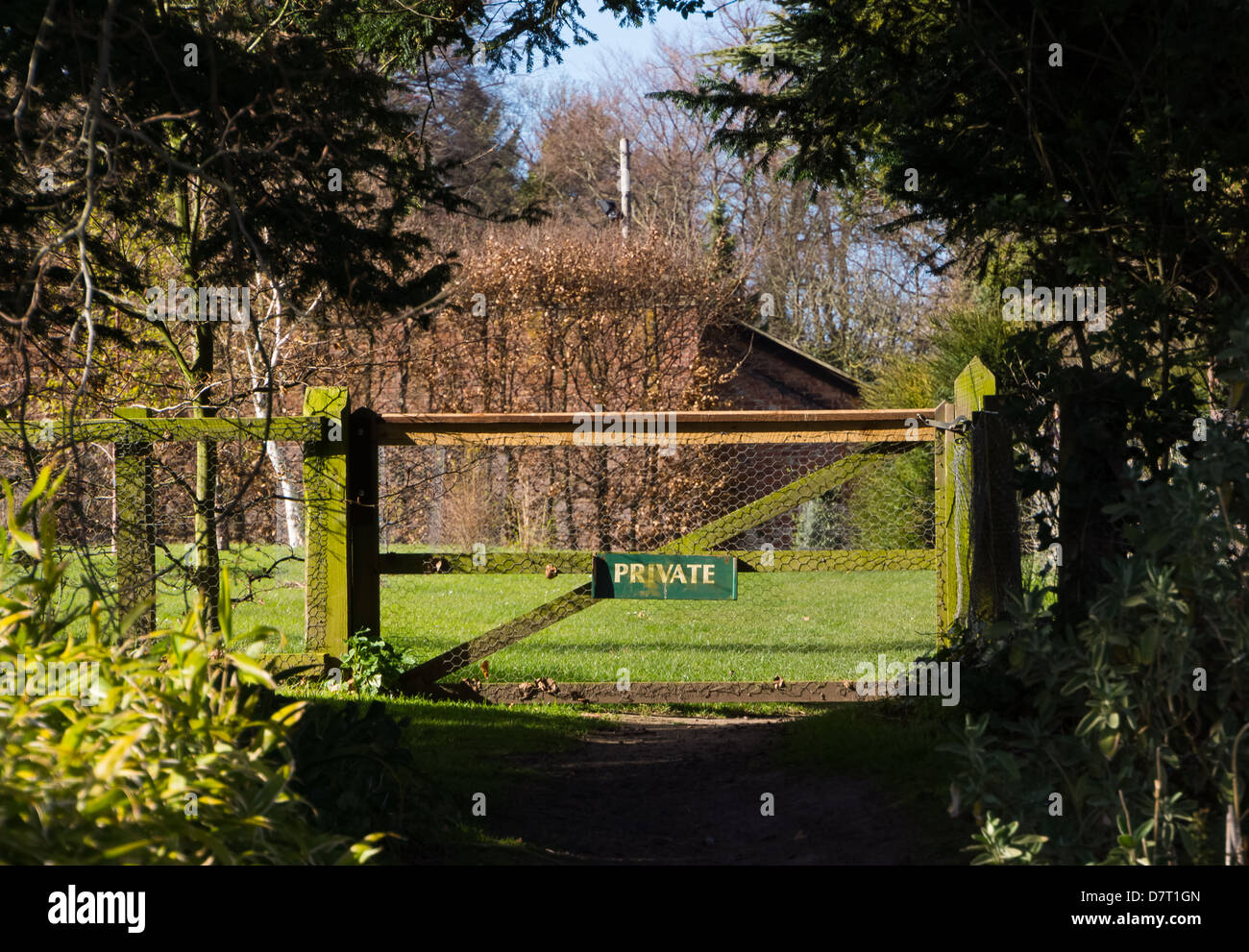 A gate leading to a private land Stock Photo - Alamy