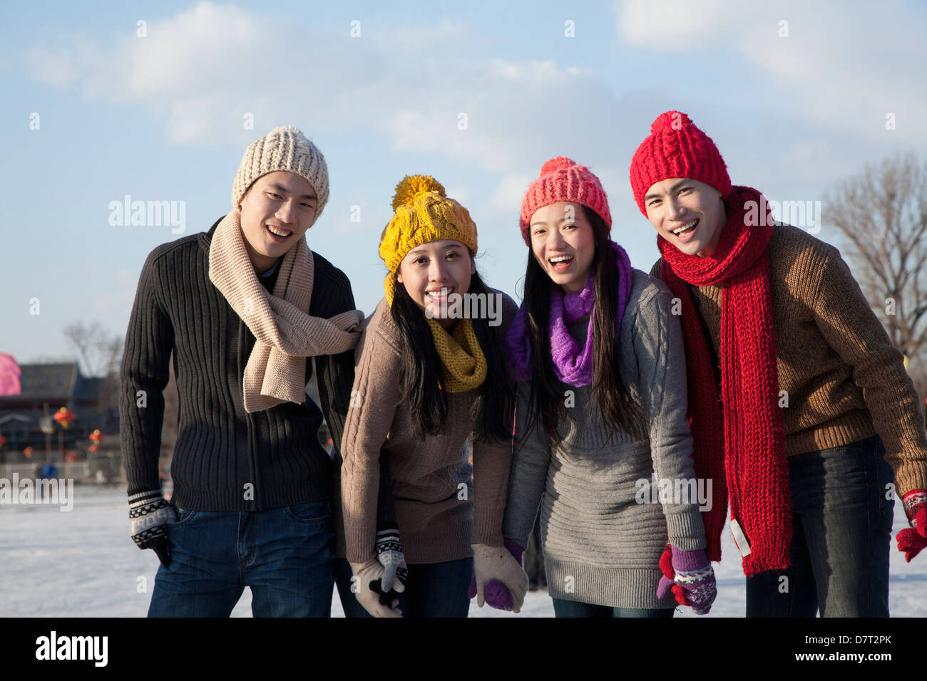 Friends on ice rink Stock Photo - Alamy