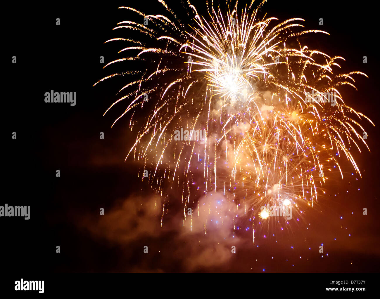 beautiful and colorful fireworks in the night sky Stock Photo - Alamy