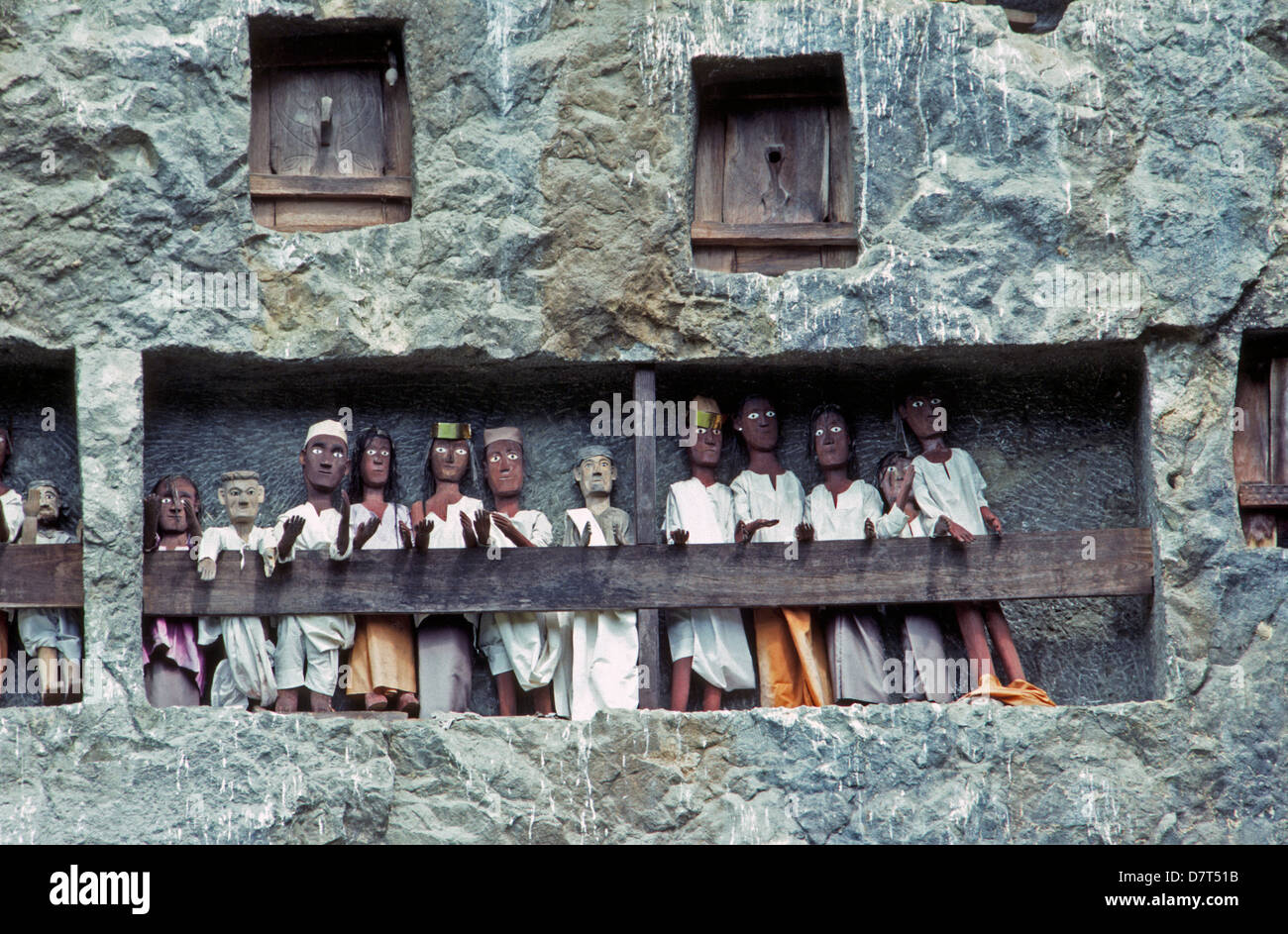 Wooden effigies of the dead, called tau-tau, protect burial sites ...
