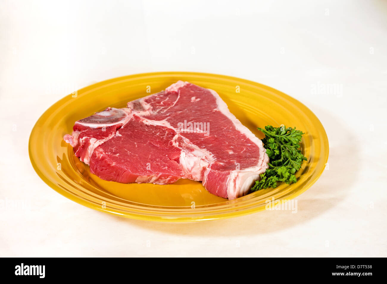 Raw steak on display Stock Photo - Alamy