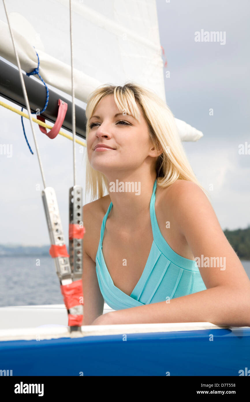 sailboat, woman, blond, happy, portrait, lake Stock Photo - Alamy