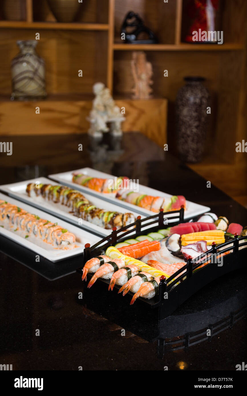 Sushi arranged on a display Stock Photo - Alamy