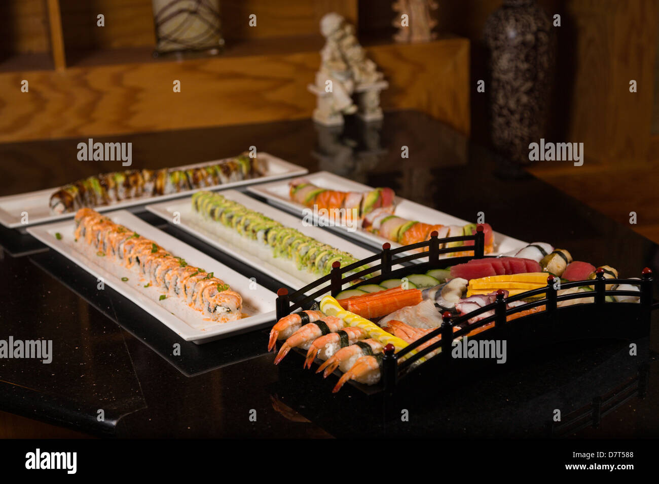 Sushi arranged in a display Stock Photo - Alamy