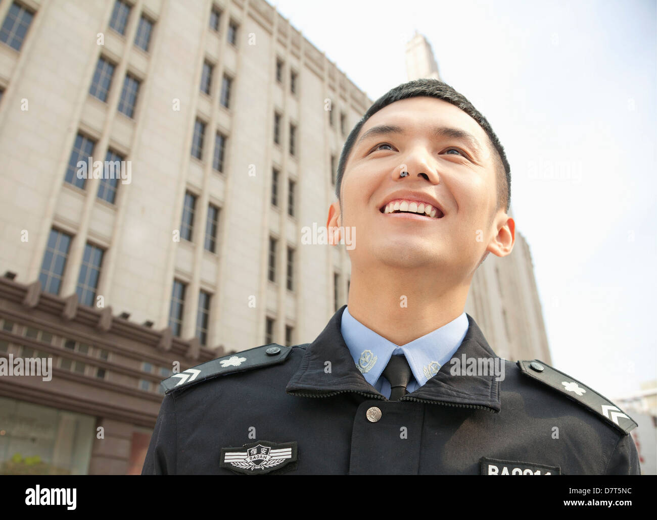 Police officer smiling low angle hi-res stock photography and images ...