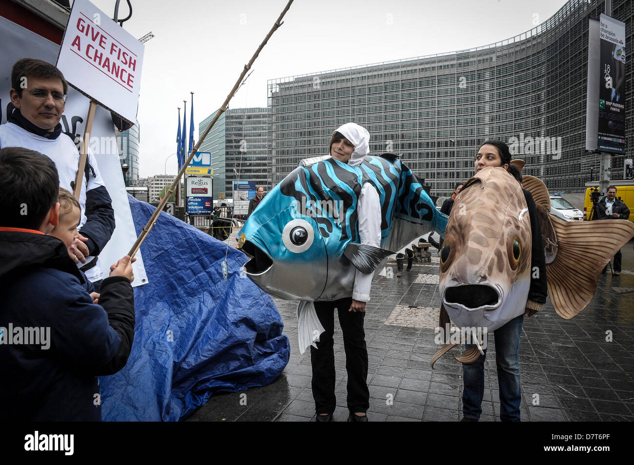 Supporters of the conservationist body WWF, some of them standing on a ...
