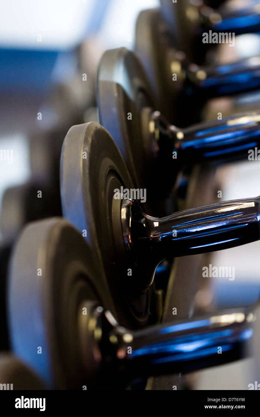 Set of weights in a small gym Stock Photo - Alamy