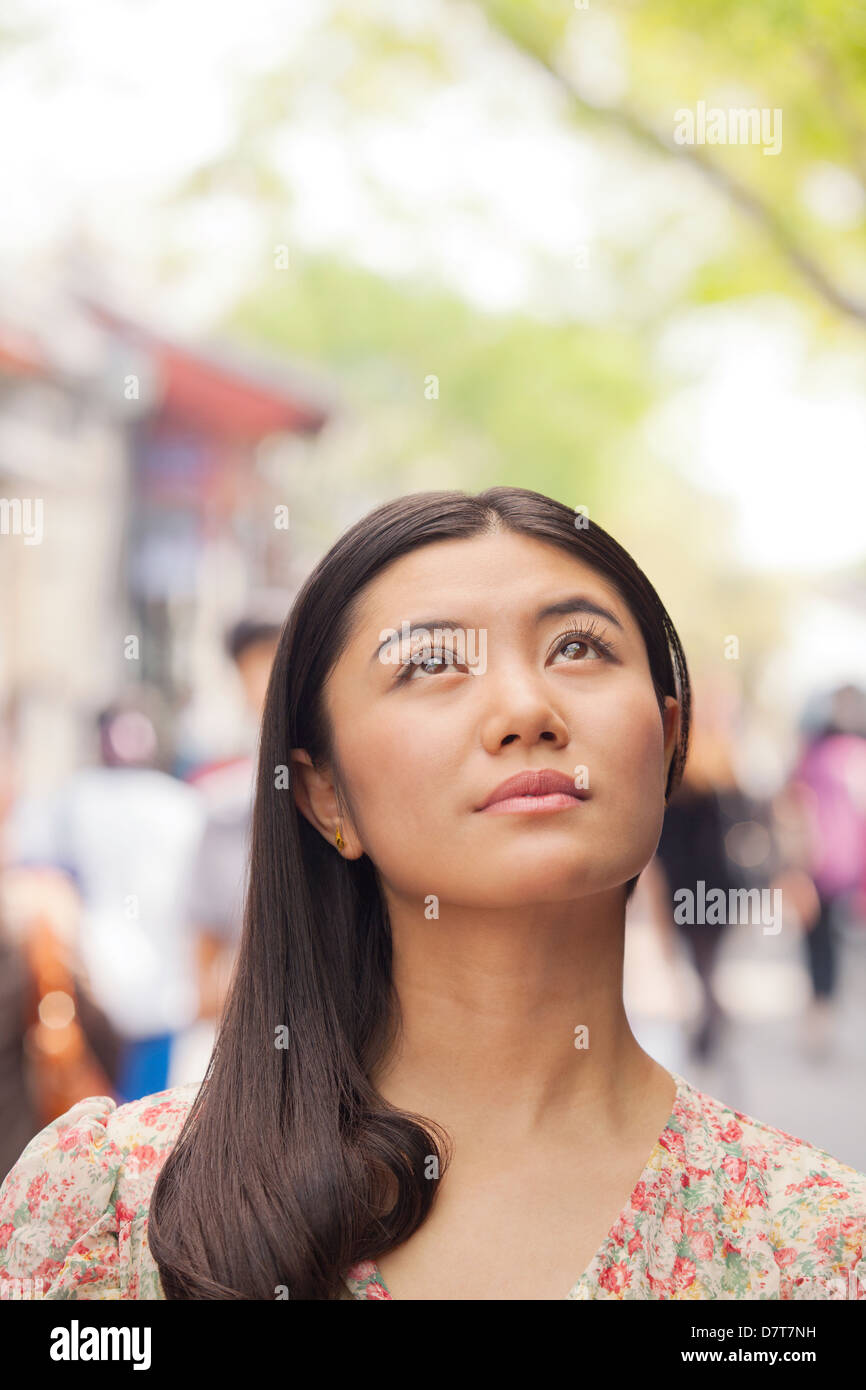 Young Woman looking up Stock Photo - Alamy