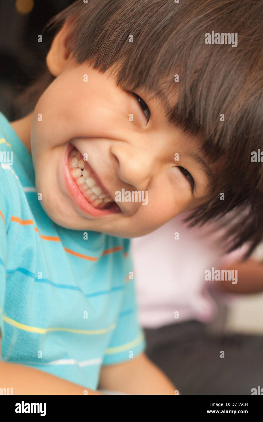 Young boy smiling Stock Photo - Alamy