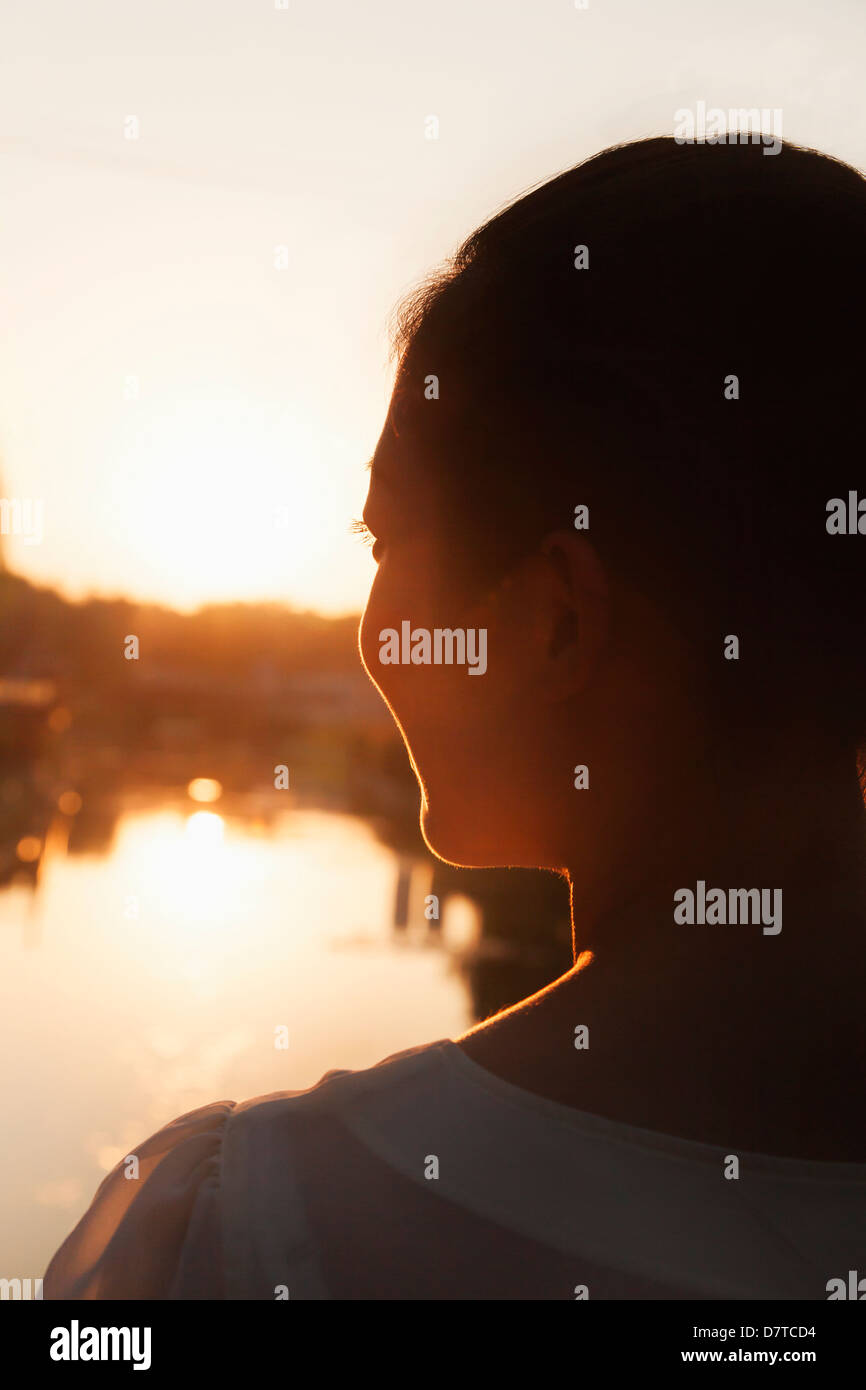 Silhouette of Woman's Face at Sunset Stock Photo - Alamy