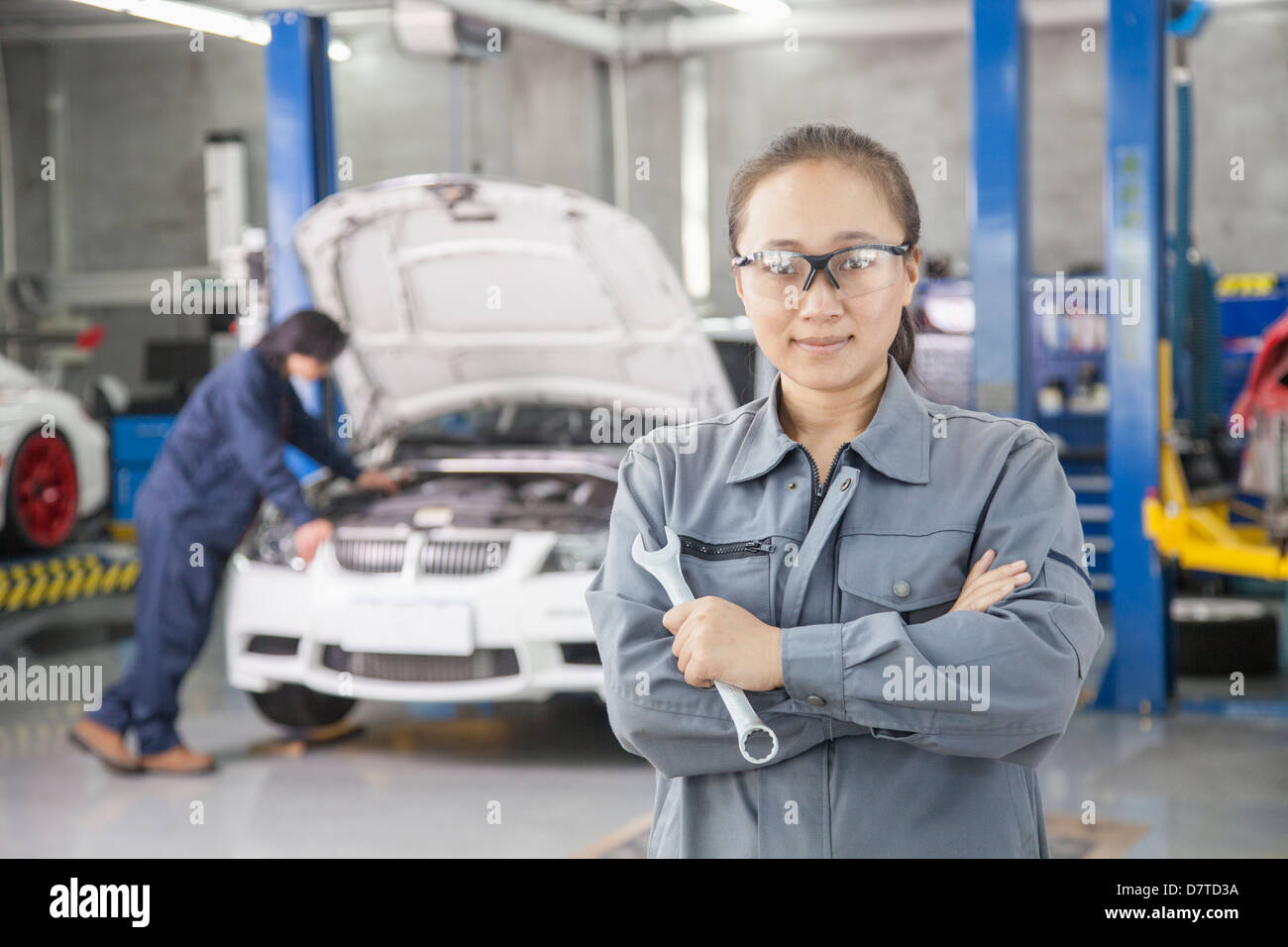 Proud Female Mechanic with Colleague Stock Photo - Alamy