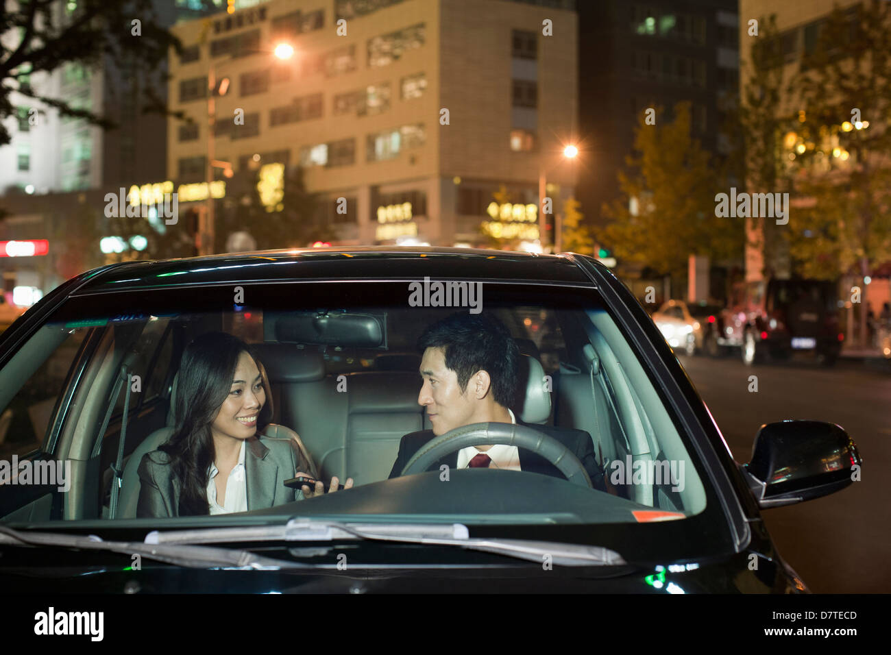 Chinese business people talking car hi-res stock photography and images ...