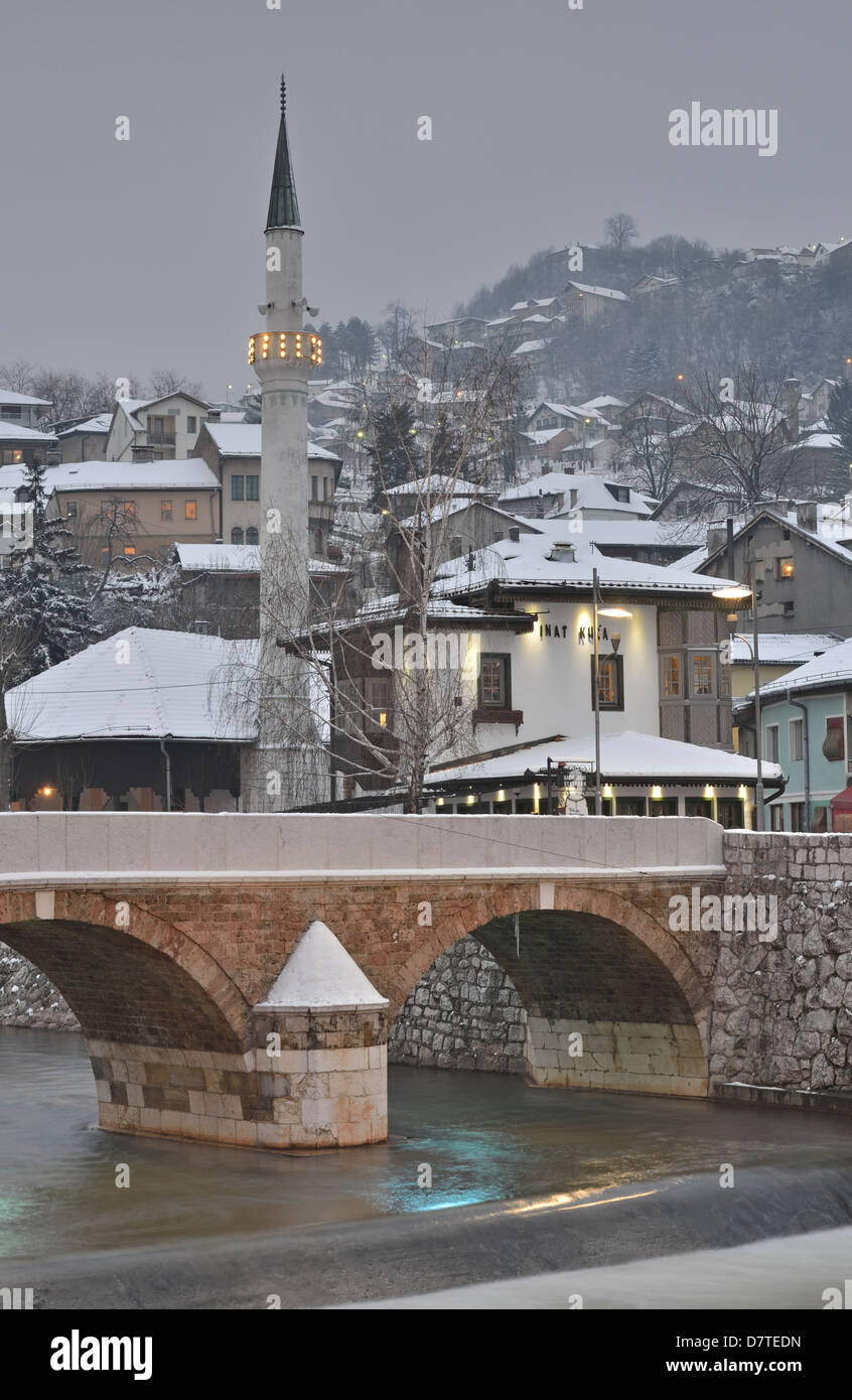 Miljacka river and Inat Kuca House in winter, Sarajevo, Bosnia and ...