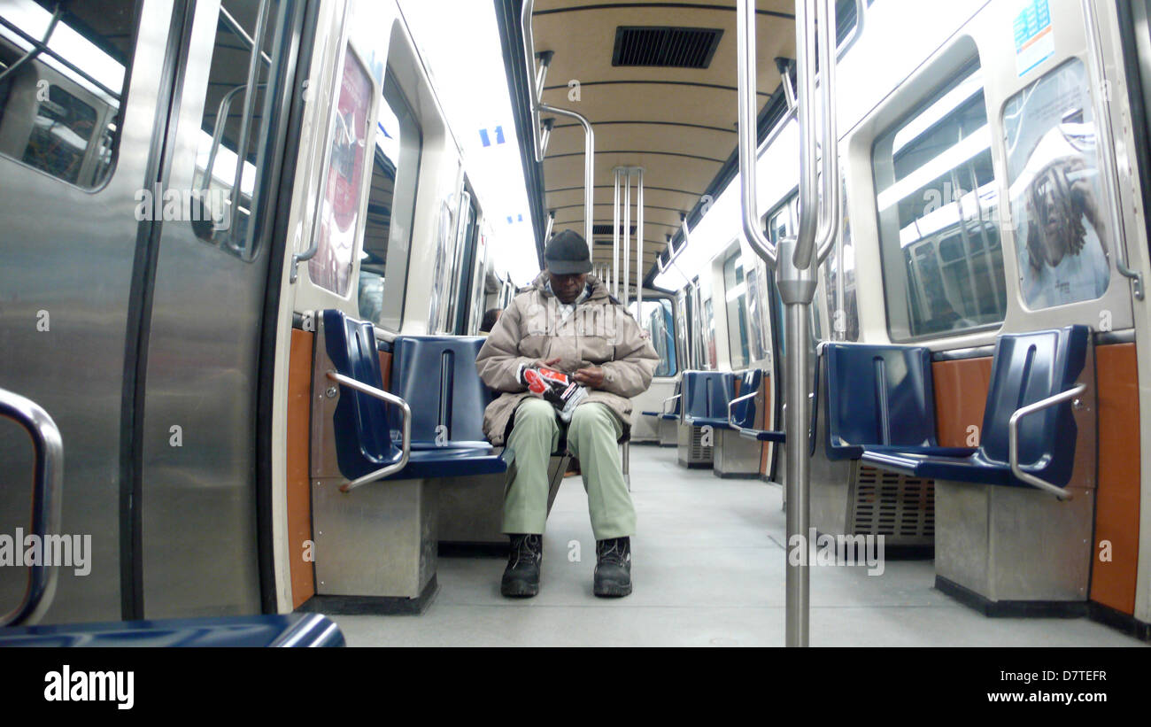 A passenger on the Metro subway train in Montreal, Quebec Stock Photo ...