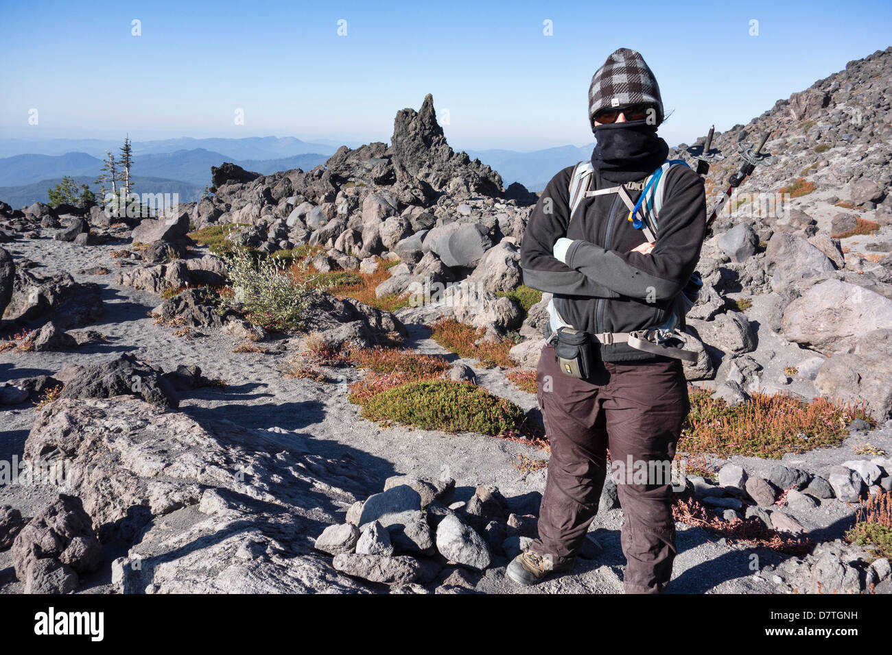 Washington. Woman on Mount Saint Helens Monitor Ridge Trail, bundled ...
