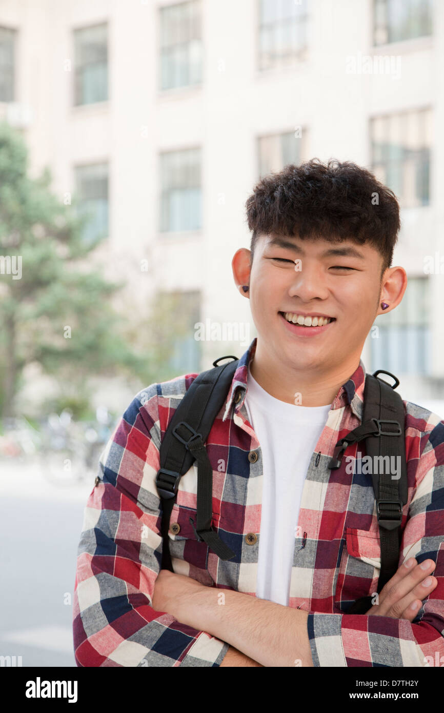 Young student with backpack, portrait Stock Photo - Alamy