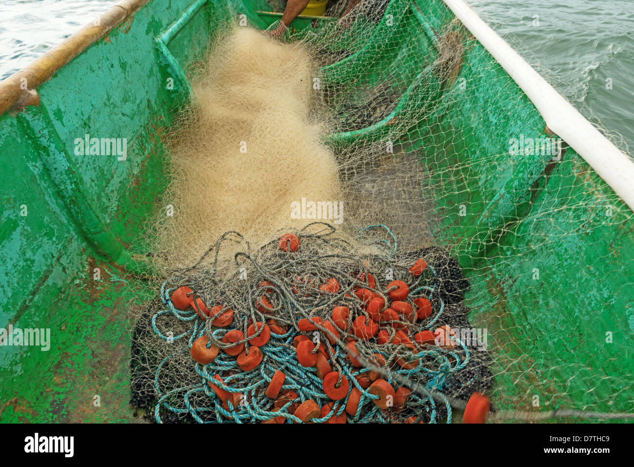 Fishing net in the fisherman boat Stock Photo - Alamy