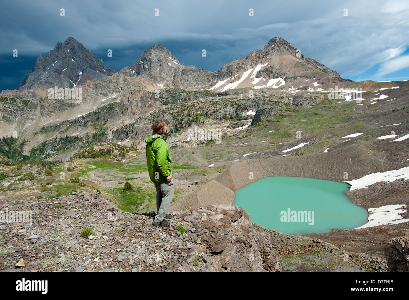 Man enjoys View of Lake from Hurricane Pass, Grand Teton National Park ...