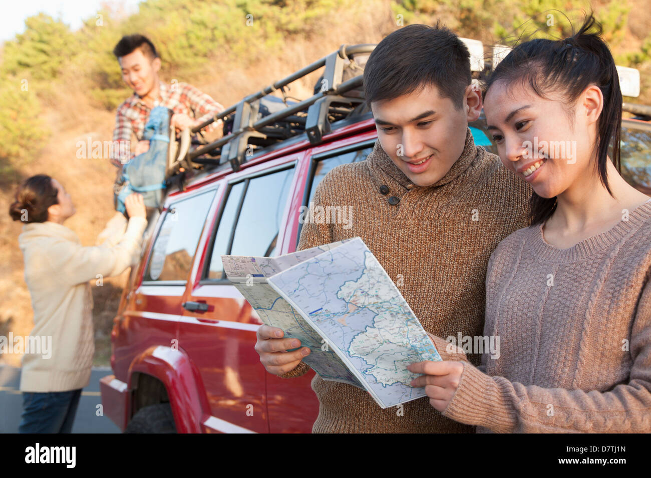 Group of people getting ready for hiking Stock Photo - Alamy