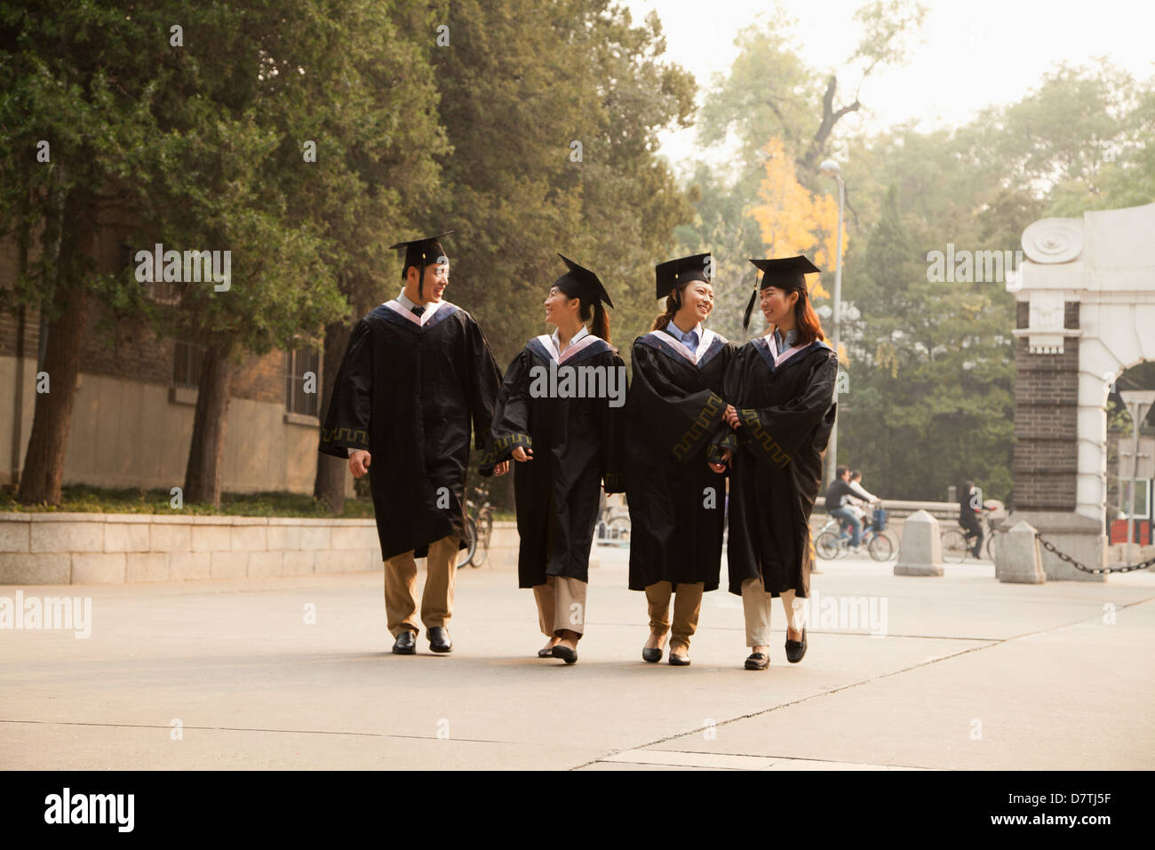 Four university graduates smiling hi-res stock photography and images ...