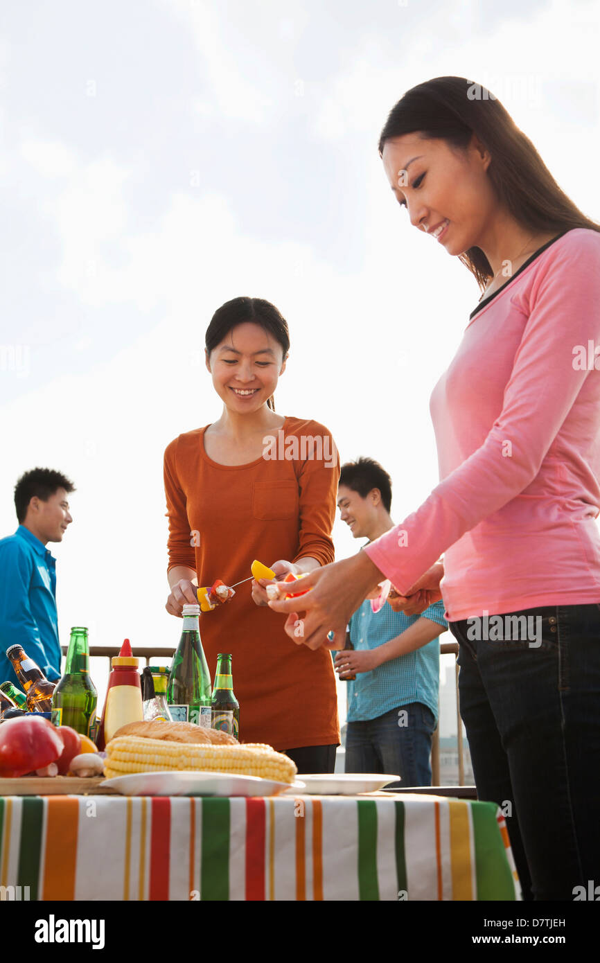 Cheerful friends having barbecue on hi-res stock photography and images ...