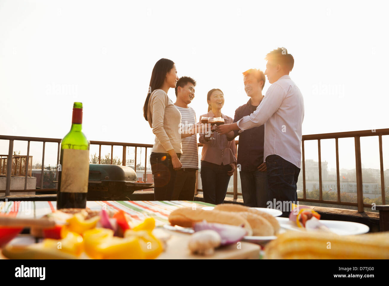 Sunset at Rooftop Barbecue Stock Photo - Alamy