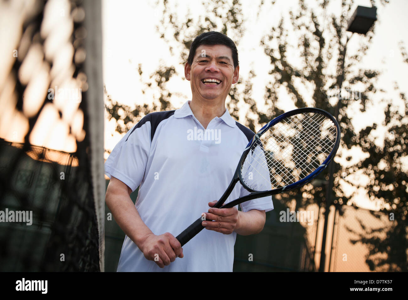 Senior men playing tennis, portrait Stock Photo - Alamy