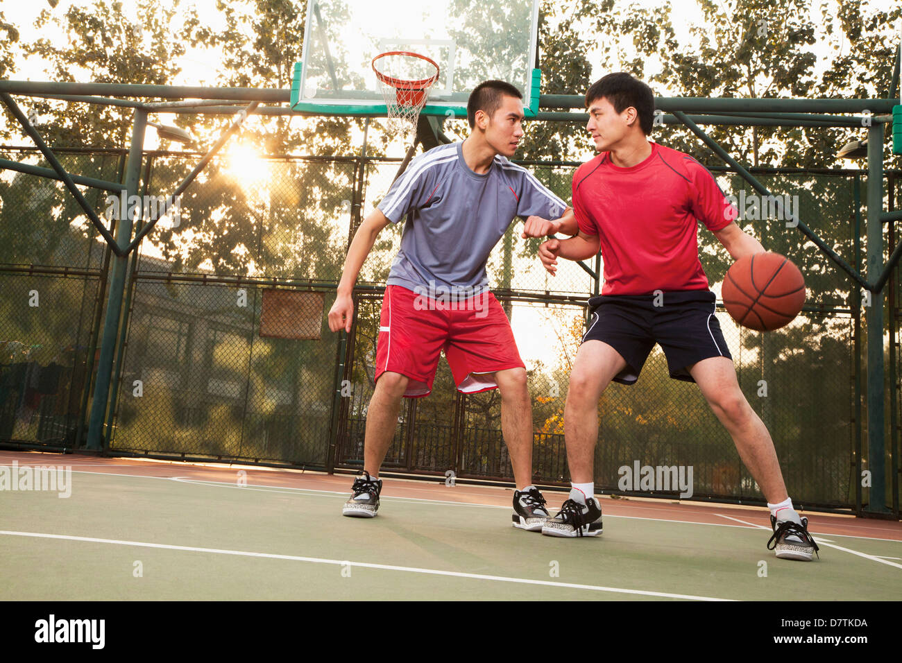 Two basketball players on court hi-res stock photography and images - Alamy