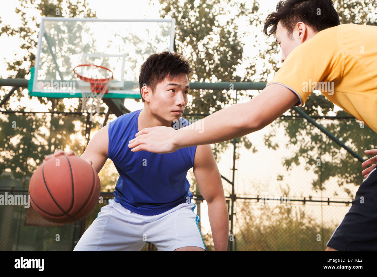 Two basketball players on court hi-res stock photography and images - Alamy