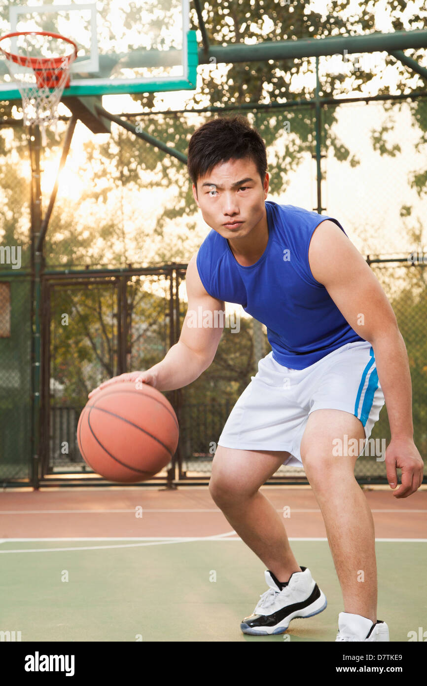 Street basketball player on the court, portrait Stock Photo - Alamy