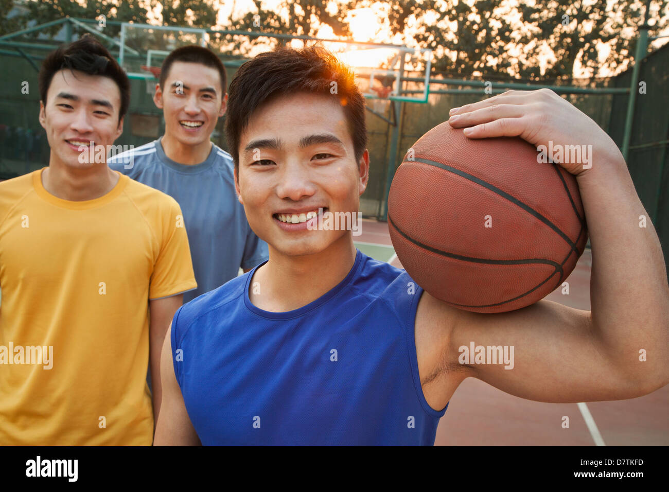 Friends on the basketball court, portrait Stock Photo - Alamy
