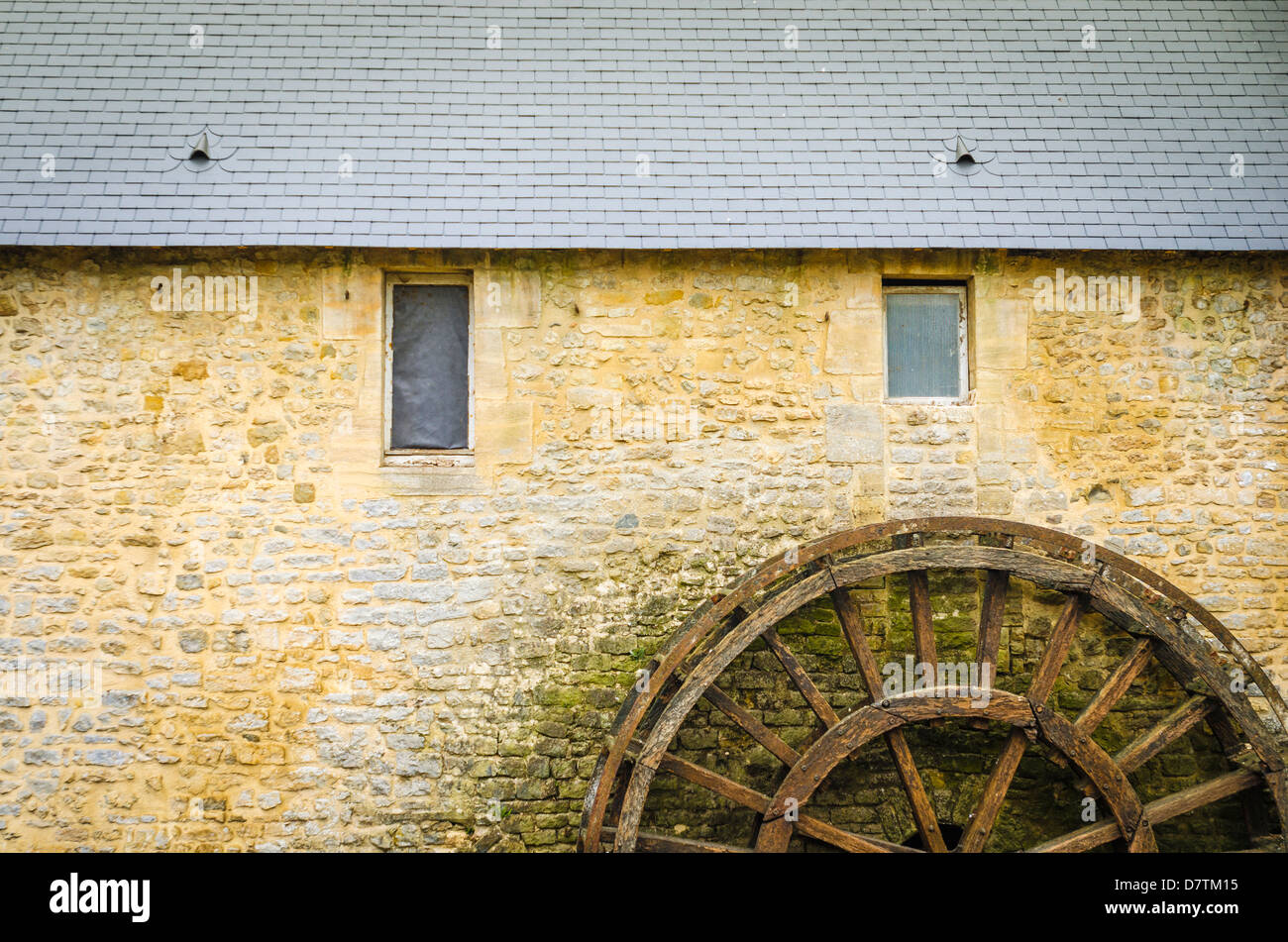 Waterwheel and stone building, Bayeux, Normandy, France Stock Photo - Alamy