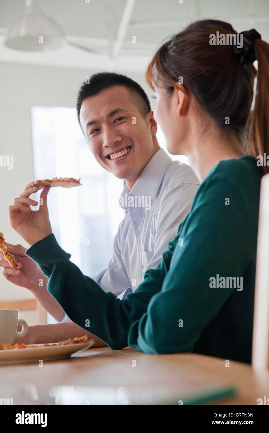 Coworkers on the lunch break, talking Stock Photo - Alamy
