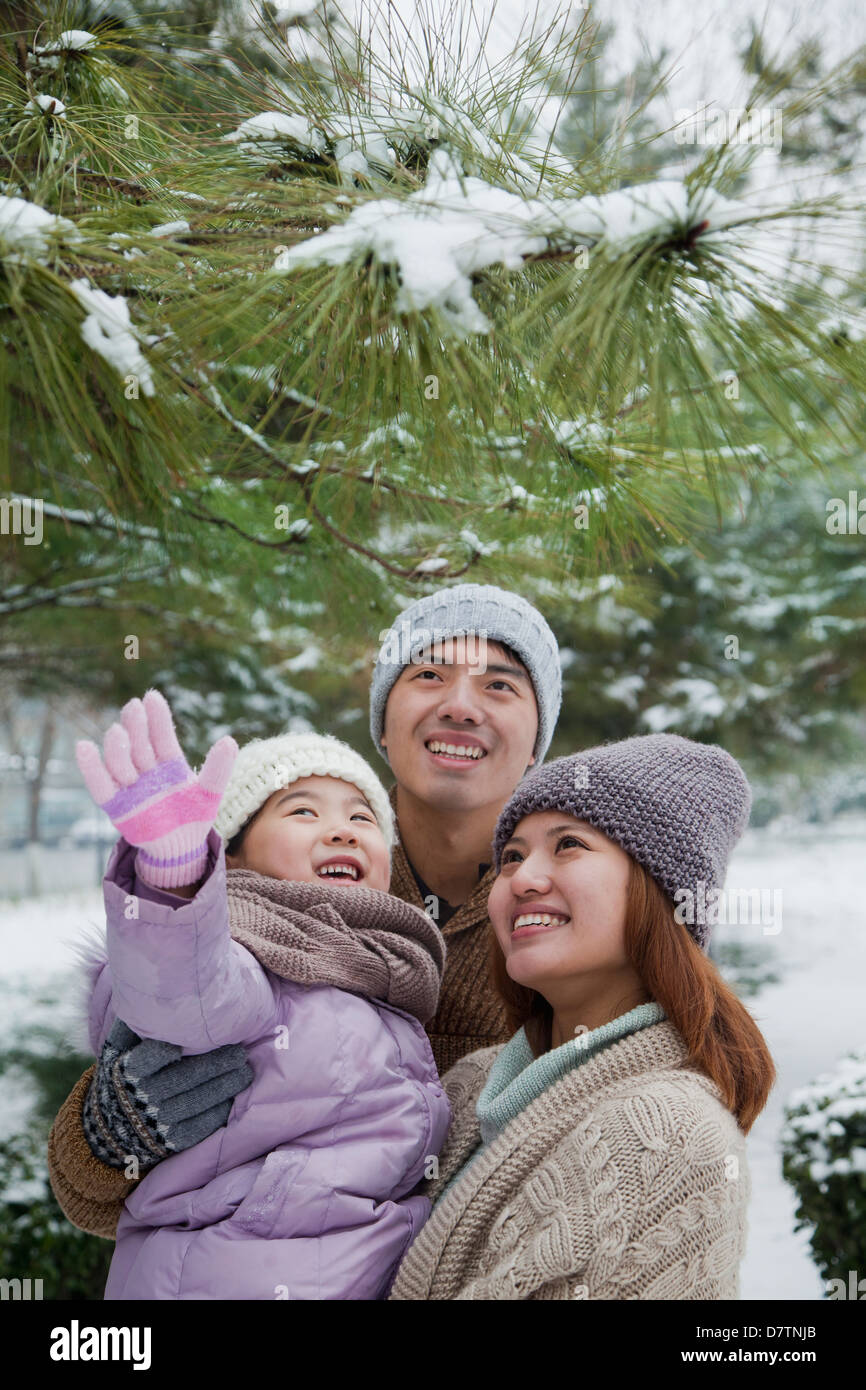Family exploring in park in winter Stock Photo - Alamy