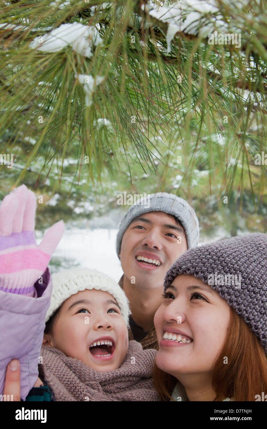 Family exploring in park in winter Stock Photo - Alamy
