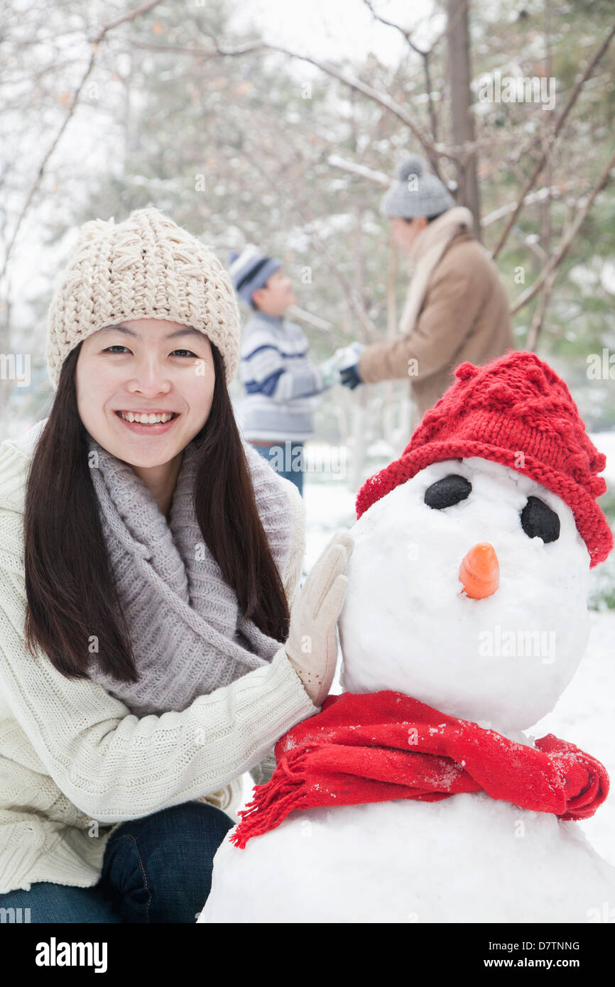 Chinese child making snowman hi-res stock photography and images - Alamy