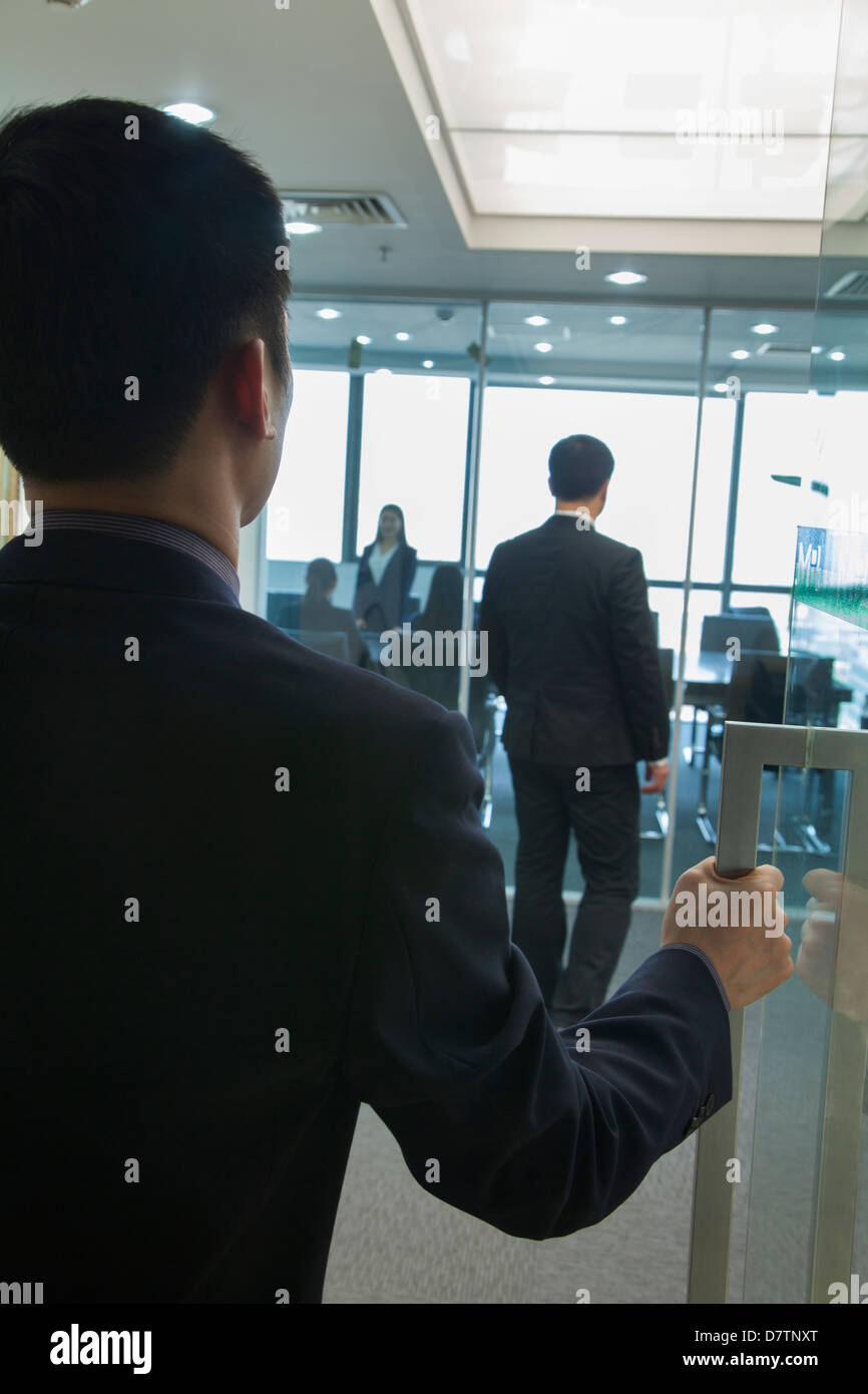 Entering an office hi-res stock photography and images - Alamy