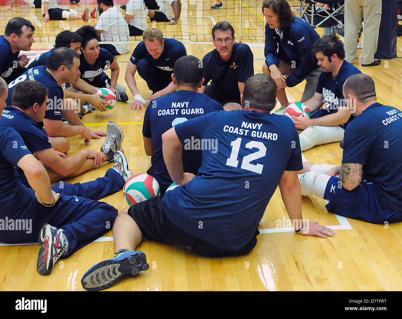 Huddle military hi-res stock photography and images - Alamy