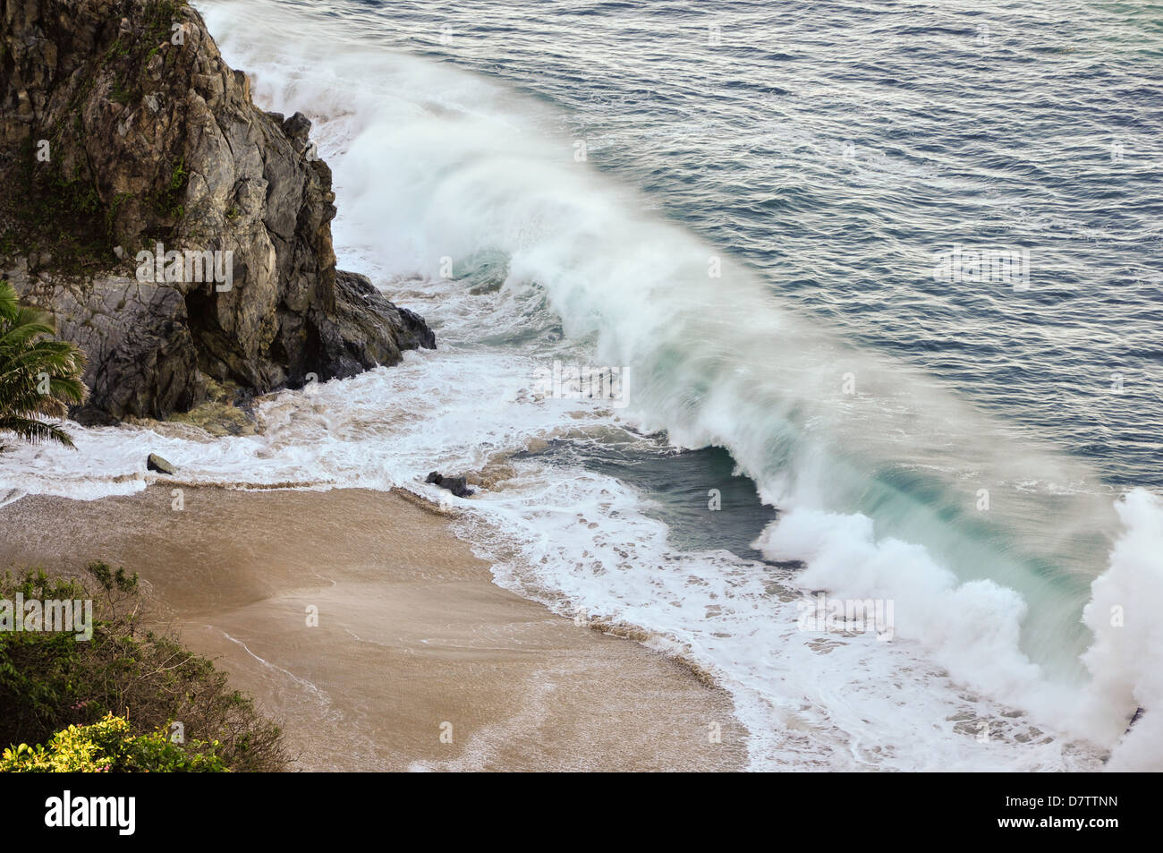 Waves crashing on a private beach from a bluff overlooking the Pacific ...