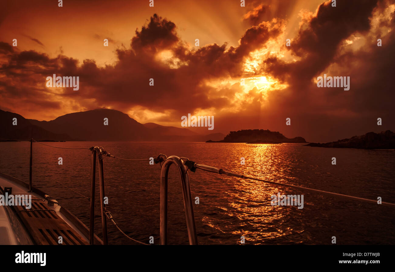 Yacht deck on red dramatic sunset, peaceful seascape, marine adventure ...