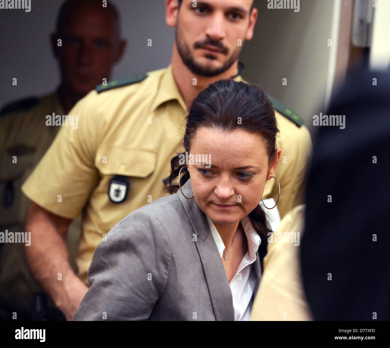 The accused Beate Zschaepe (FRONT) is led into the courtroom for the ...