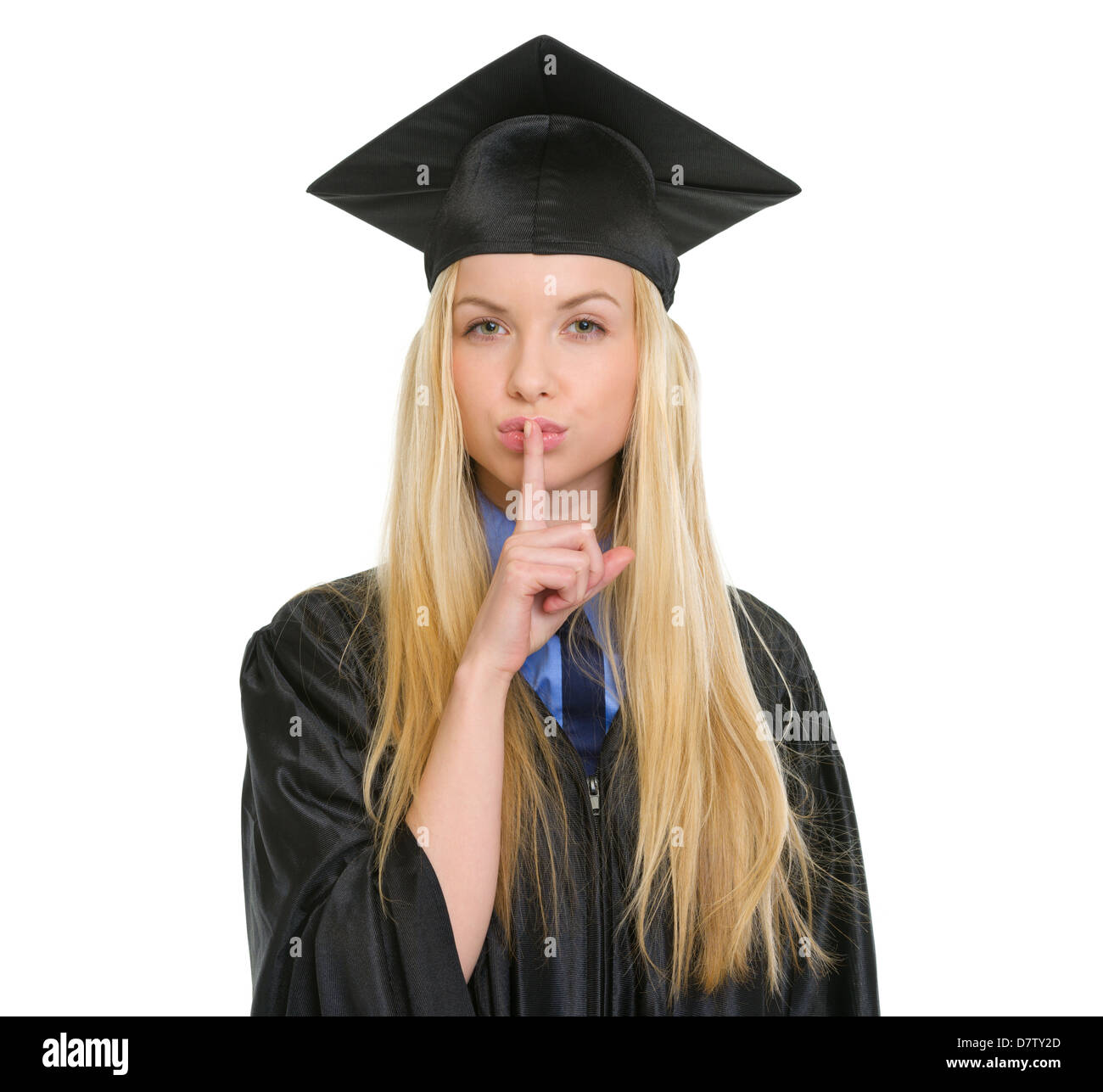 Young woman in graduation gown showing shh gesture Stock Photo - Alamy