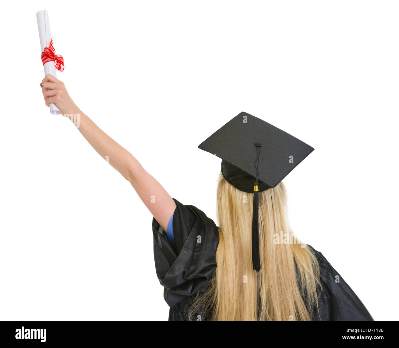 Woman in graduation gown with diploma rejoicing success . rear view ...